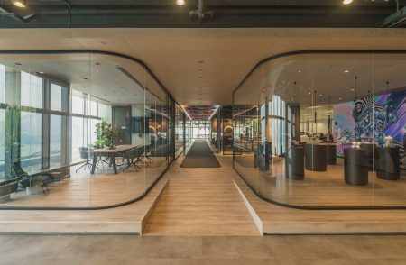 Curved Glass Partition Walls for Elegant Interiors